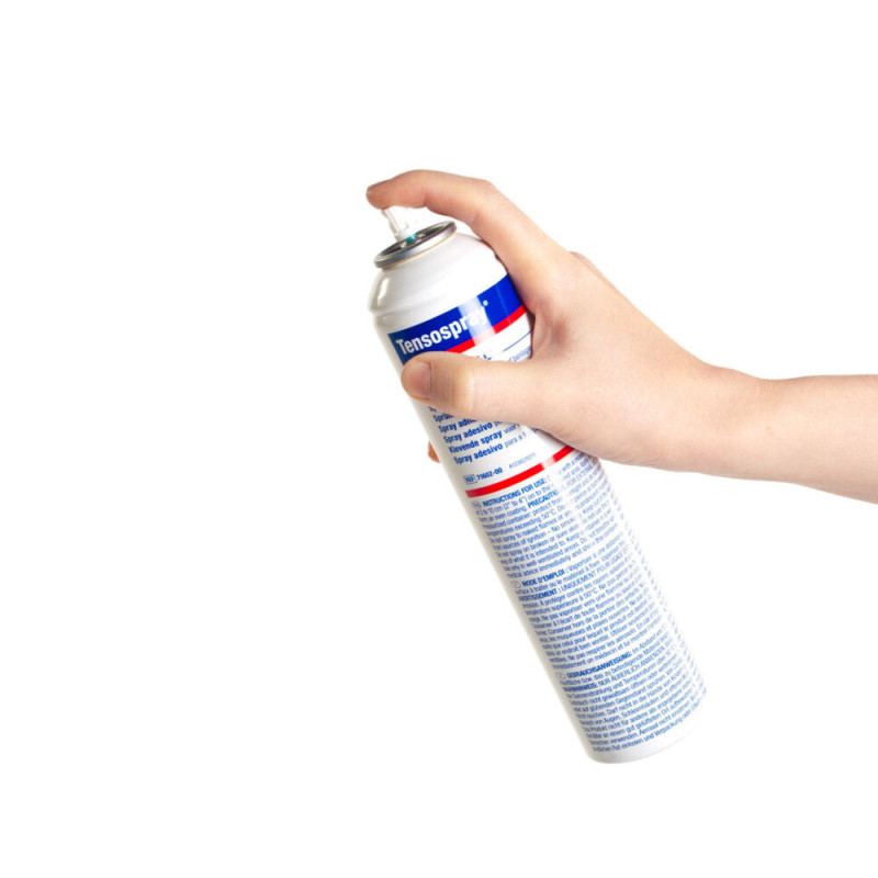 Adhesive spray for kinesiology tape